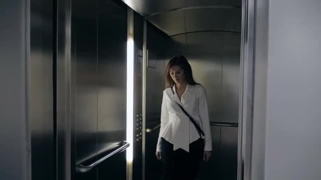 Stepping Out Of Elevator - Stock Video | Motion Array