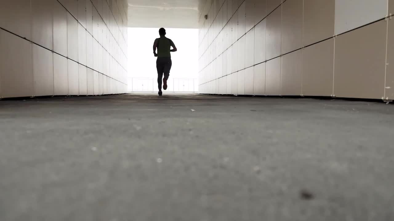 Athlete Running On The Street - Stock Video | Motion Array