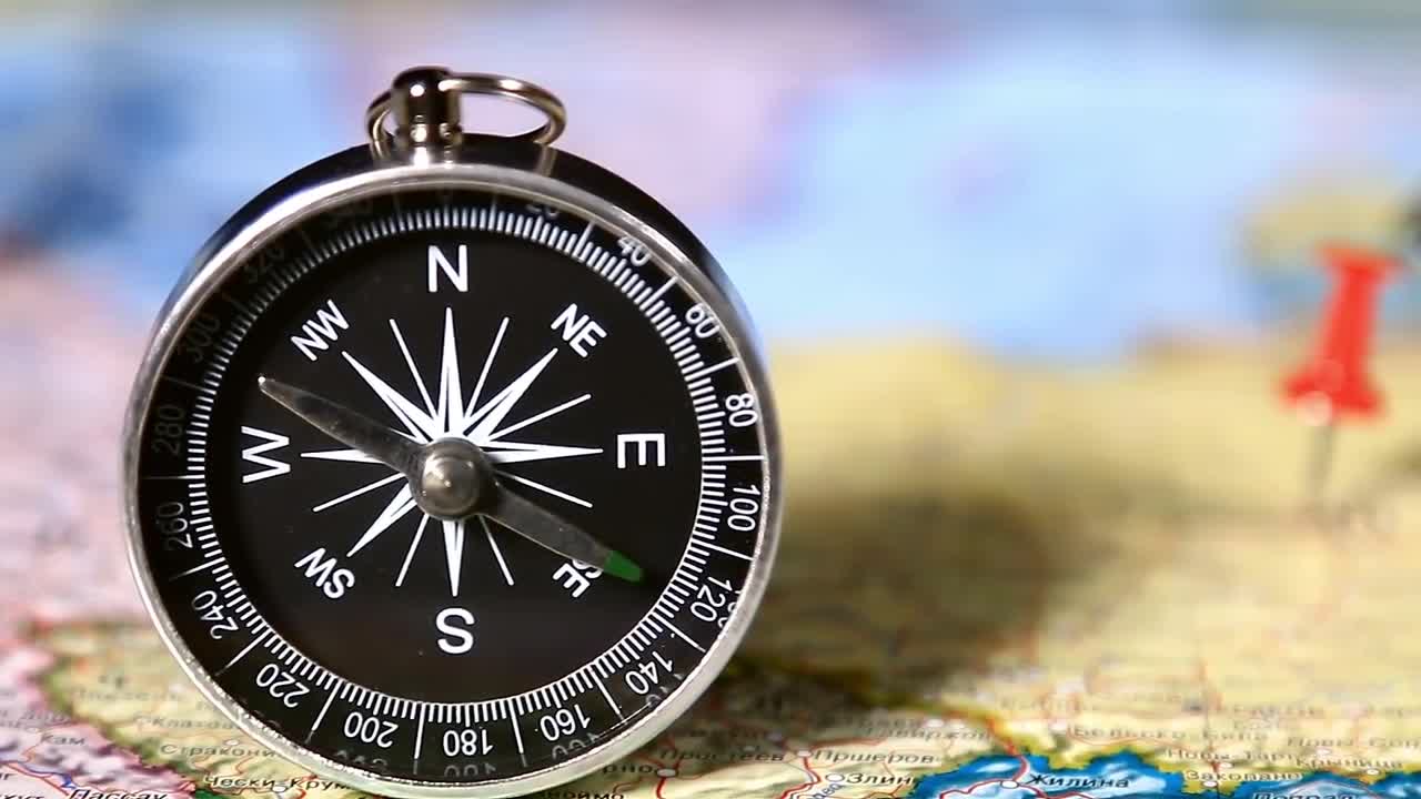 Compass On A Map - Stock Video | Motion Array