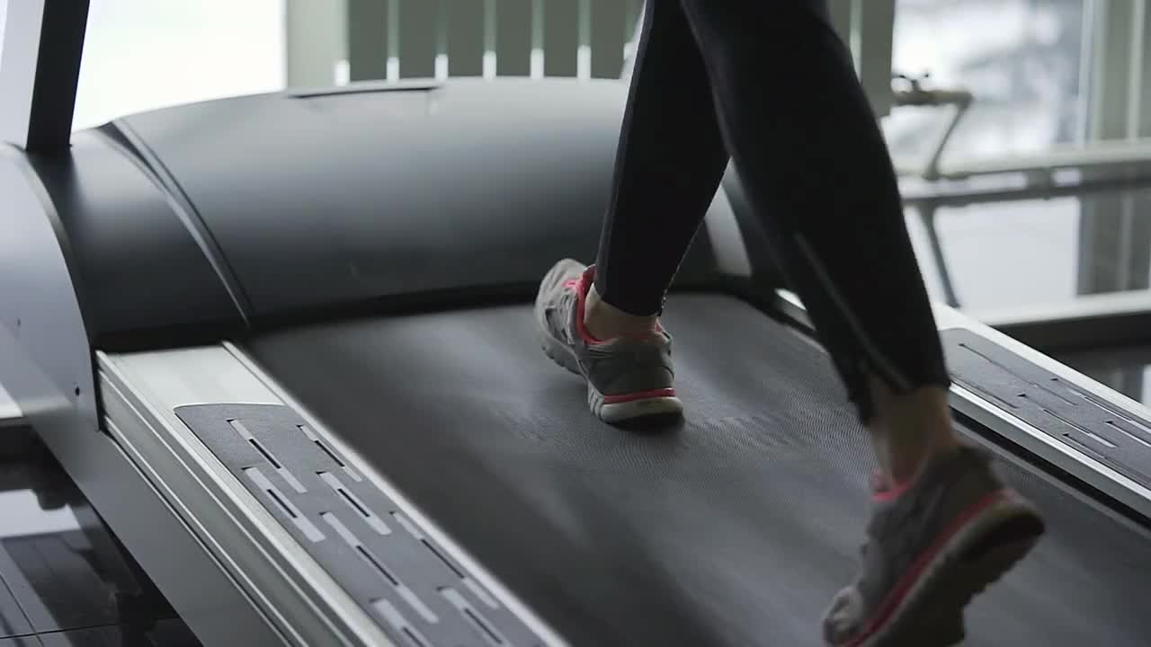 Treadmill Walking - Stock Video | Motion Array
