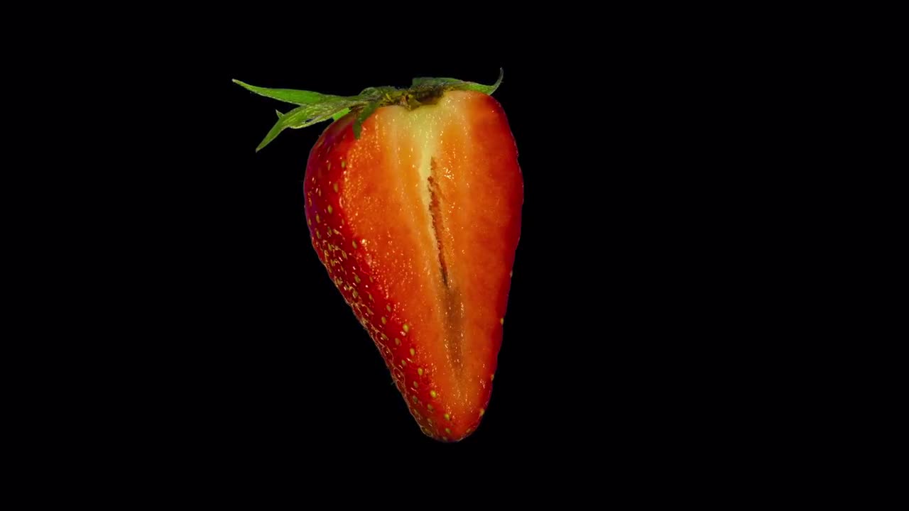 Isolated Strawberry Slice - Stock Video | Motion Array