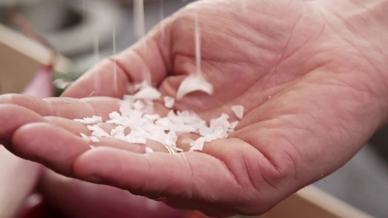 Pouring Salt Onto Hand - Stock Video | Motion Array