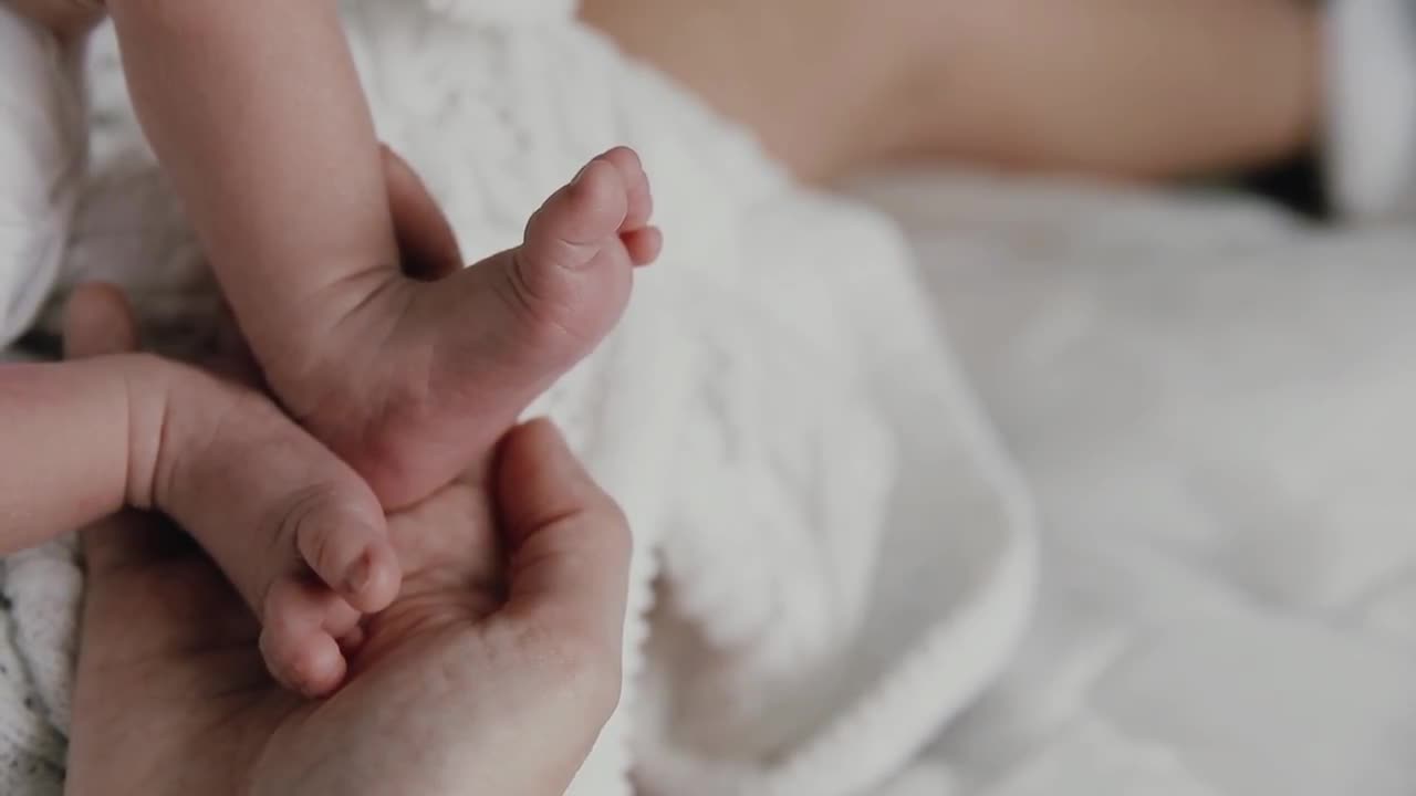 Tickling Baby's Feet - Stock Video | Motion Array