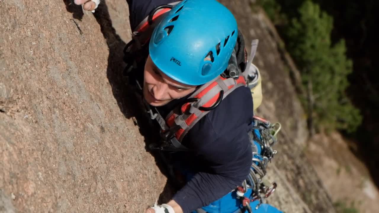 Climber Clinging To A Rocky Ledge - Stock Video | Motion Array