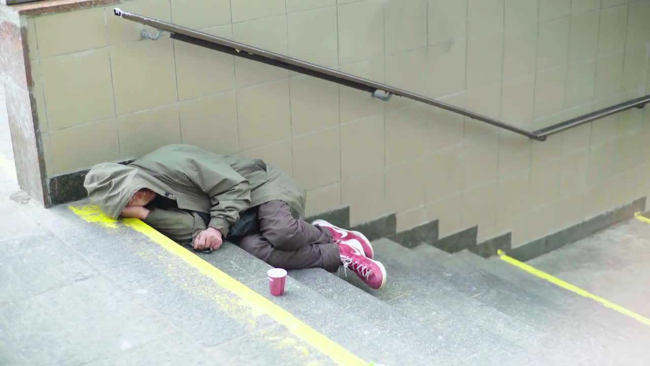 Sleeping On The Stairs - Stock Video | Motion Array