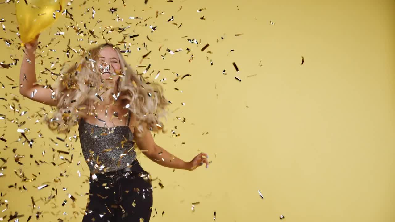 Dancing In Gold Confetti - Stock Video | Motion Array