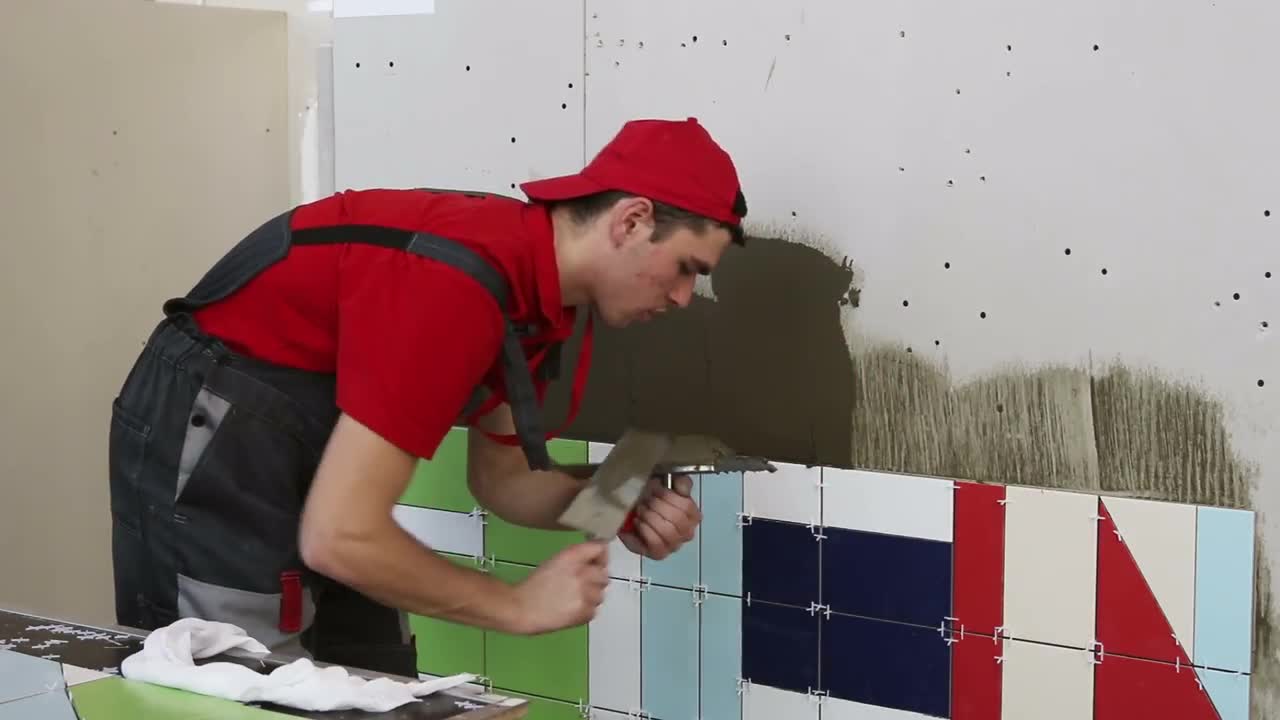 Laying Wall Tiles - Stock Video | Motion Array