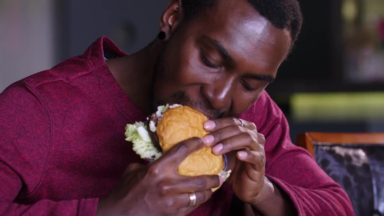 Man Eating Big Burger - Stock Video | Motion Array
