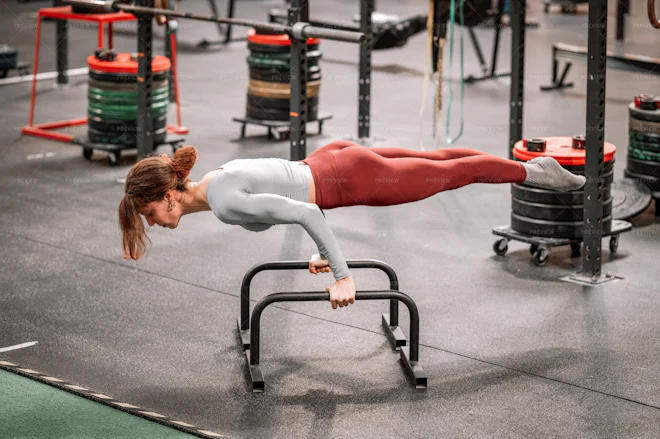 Fit Woman Performing Bent Arm Planche Calisthenics Exercise - Stock ...