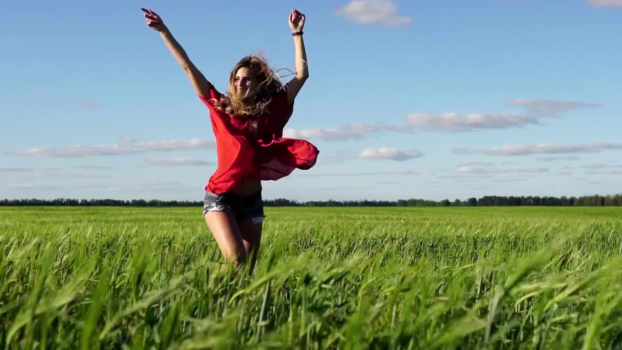 Twirling On A FIeld - Stock Video | Motion Array