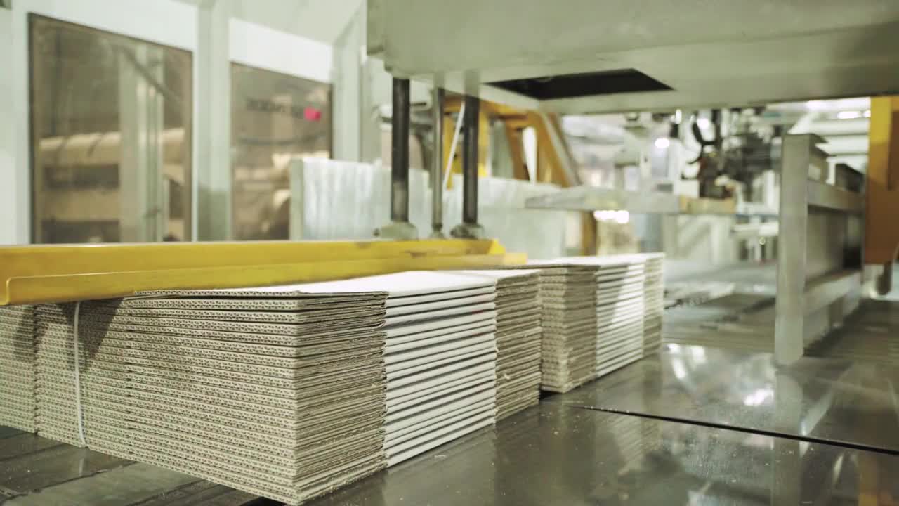 Compressing Cardboard Stacks - Stock Video | Motion Array