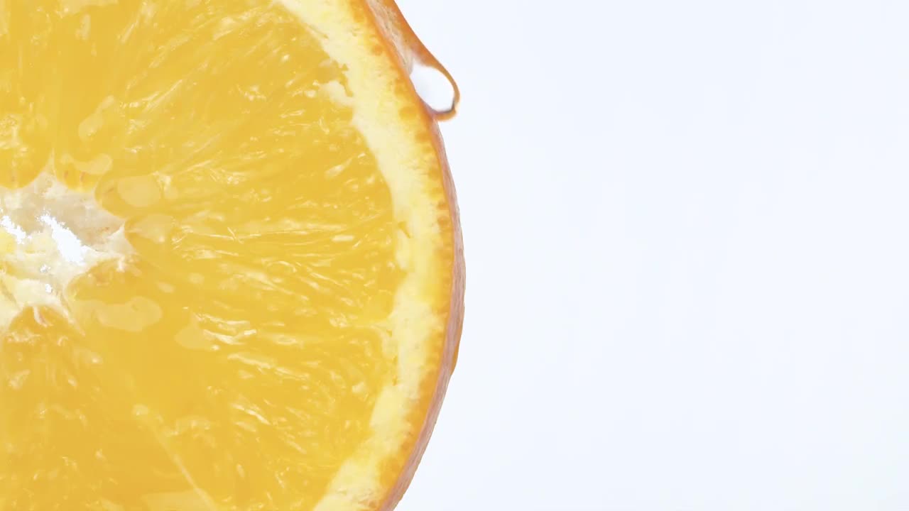 Juice Falling From Orange - Stock Video | Motion Array