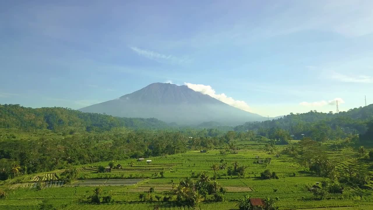 Agung Volcano Overlooking Farmland - Stock Video | Motion Array