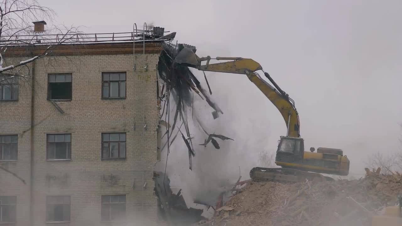 Excavator Demolishes Building - Stock Video | Motion Array