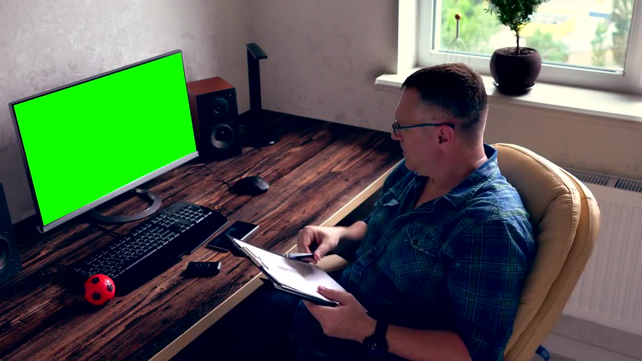 Man Using PC With Green Screen - Stock Video | Motion Array