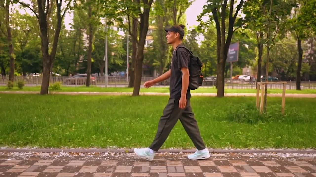 Man Walking With Backpack - Stock Video | Motion Array