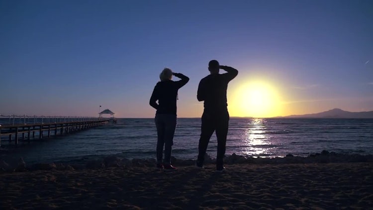 Couple Looking Into The Distance - Stock Video | Motion Array