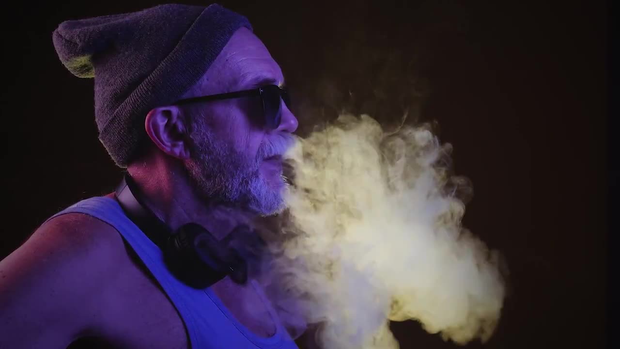 Old Man Vaping - Stock Video | Motion Array