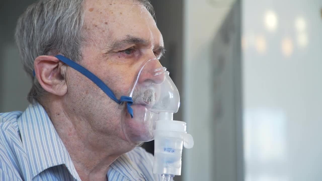 Elderly Man Using Nebulizer Mask - Stock Video | Motion Array