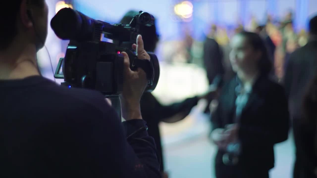 Cameraman Filming Interview - Stock Video | Motion Array