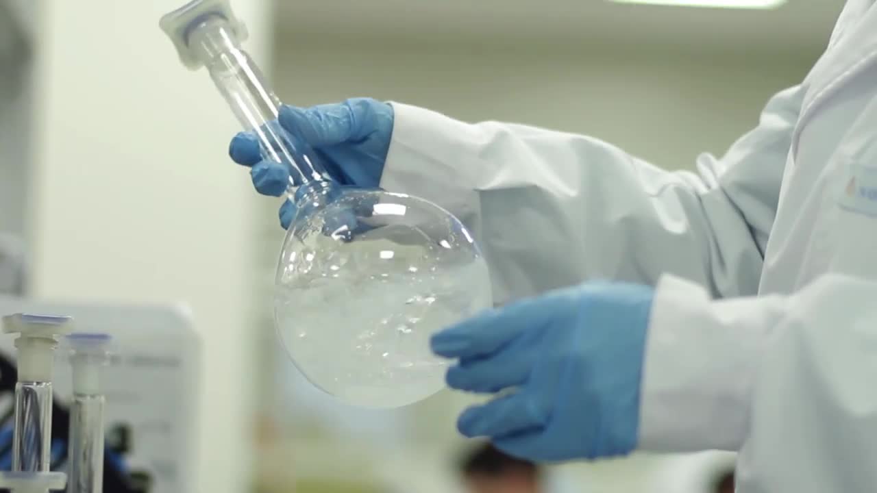 Pouring Chemicals In Flask - Stock Video | Motion Array