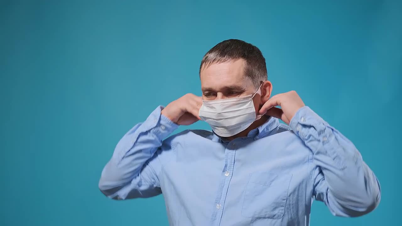 Man Puts On Face Mask - Stock Video | Motion Array