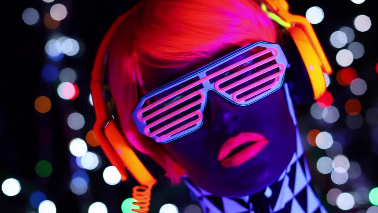 Neon Raver In Headphones - Stock Video | Motion Array