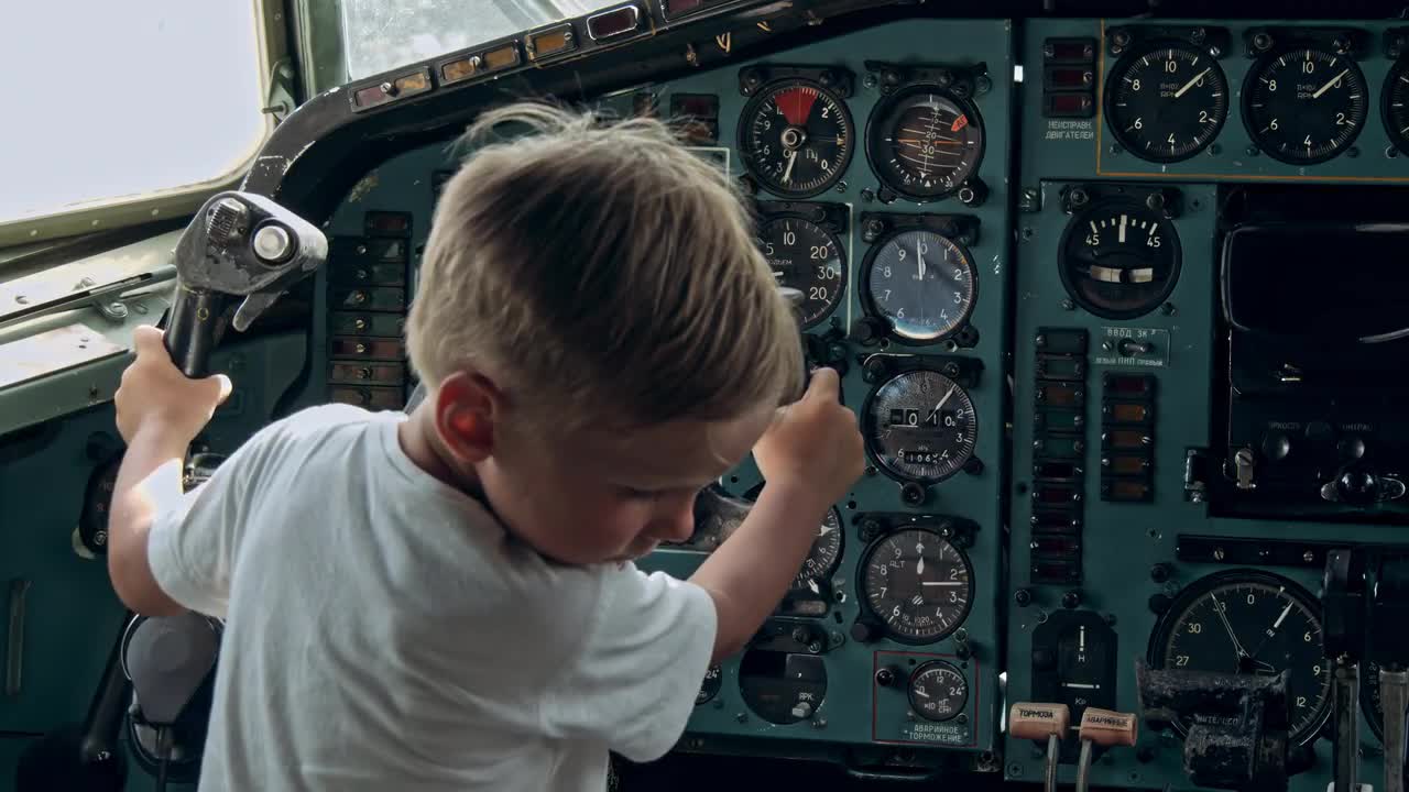 Kid In A Cockpit - Stock Video | Motion Array