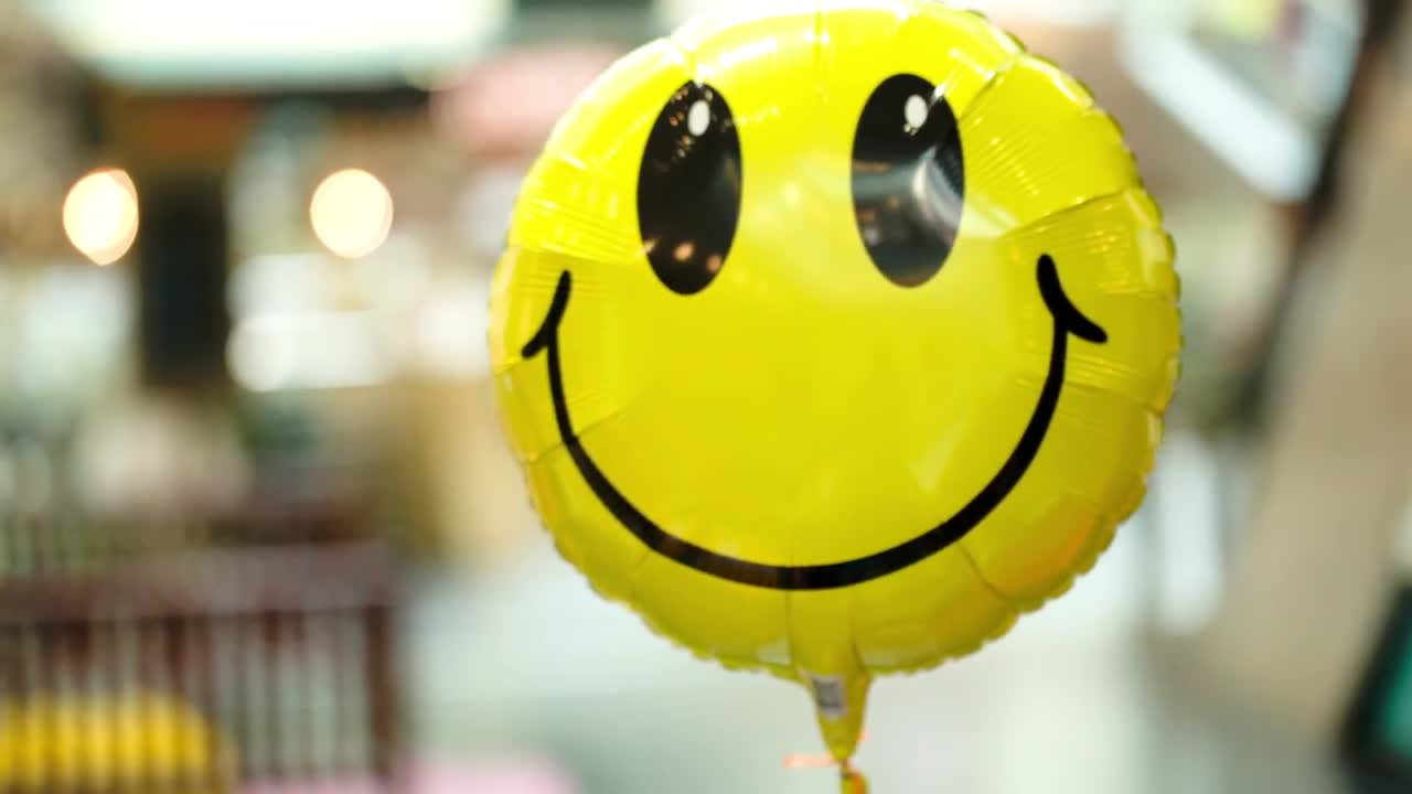 Smiley Face Balloon Floating - Stock Video | Motion Array