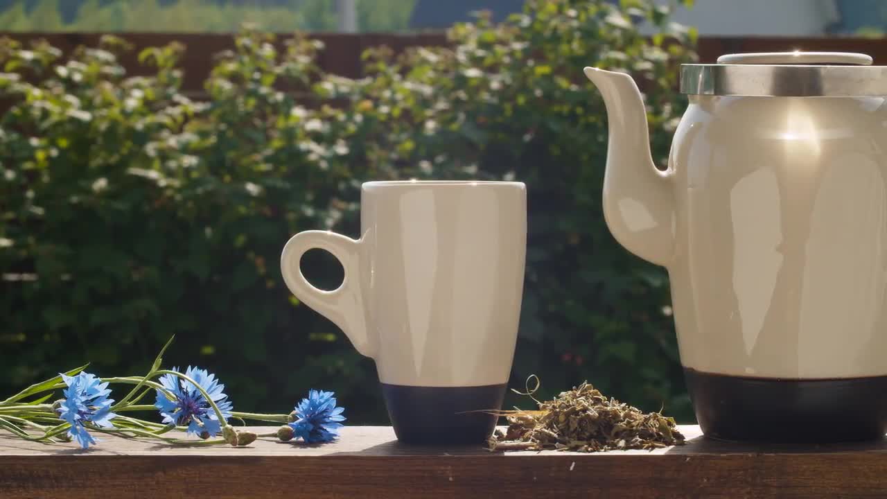 Teacup And Teapot On A Table - Stock Video | Motion Array