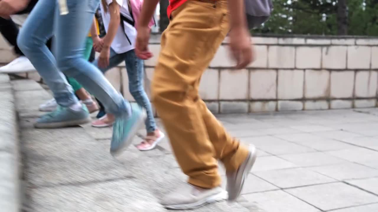 Group Of Students Run Up Stairs - Stock Video | Motion Array