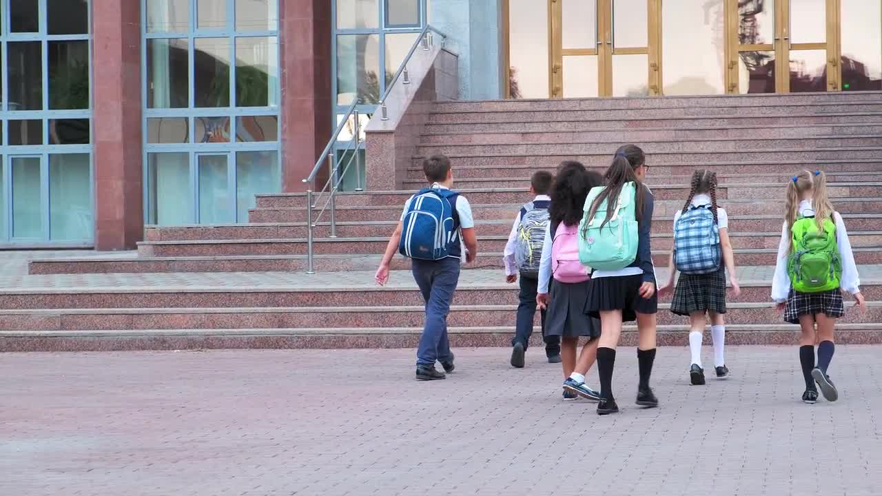 Kids Walk To School - Stock Video | Motion Array