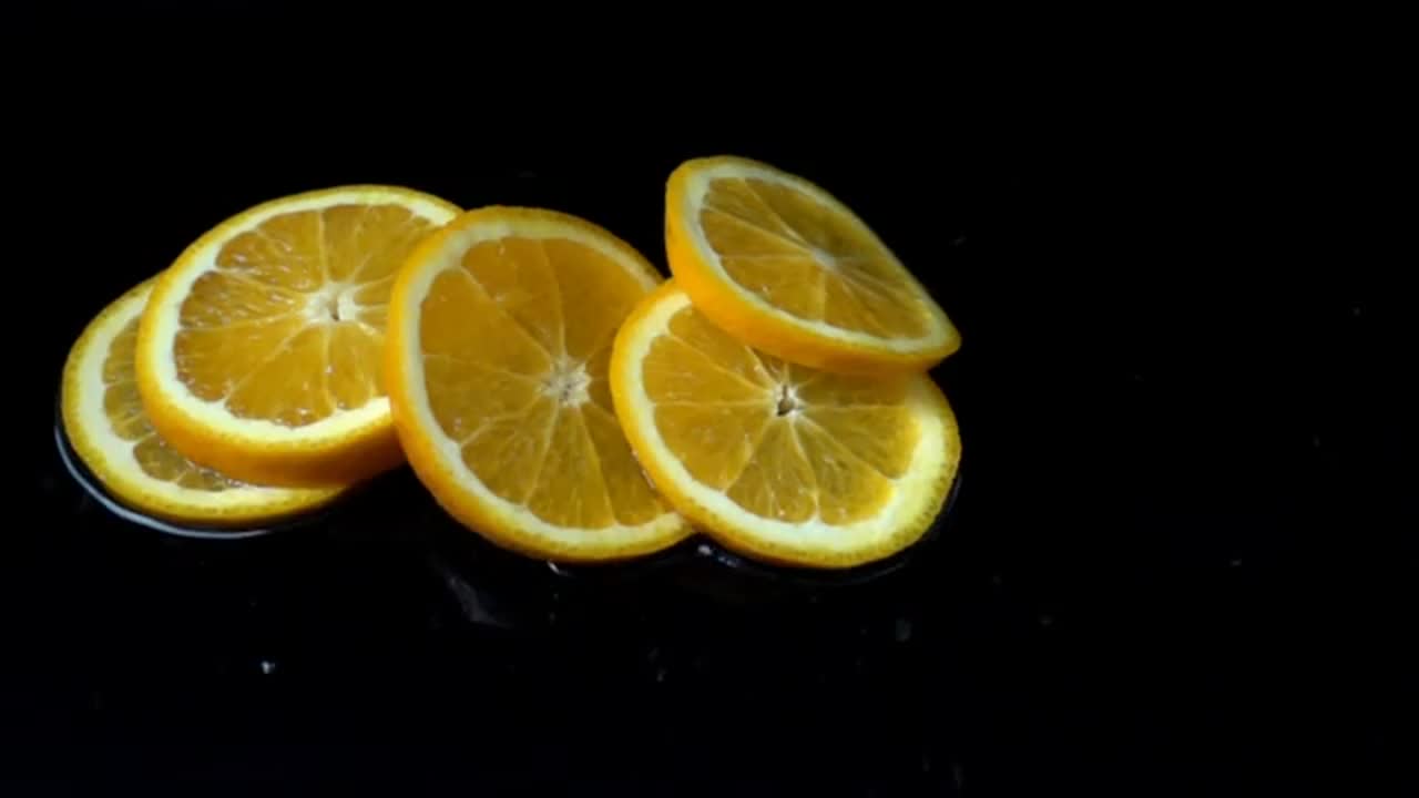 Falling Orange Slices - Stock Video | Motion Array