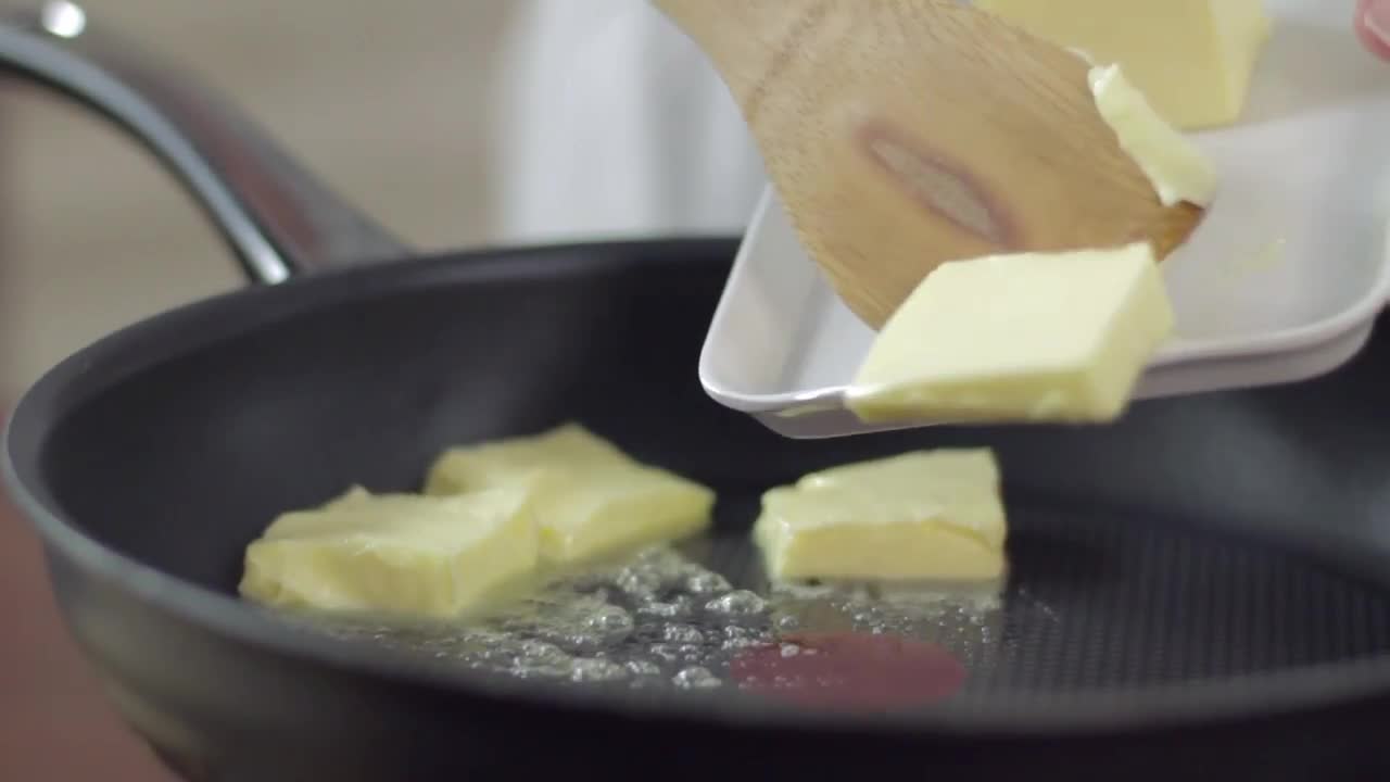 Butter Melting On Frying Pan - Stock Video | Motion Array