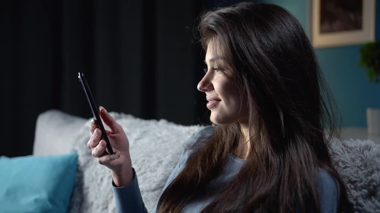 Woman Scrolling On Smartphone - Stock Video | Motion Array
