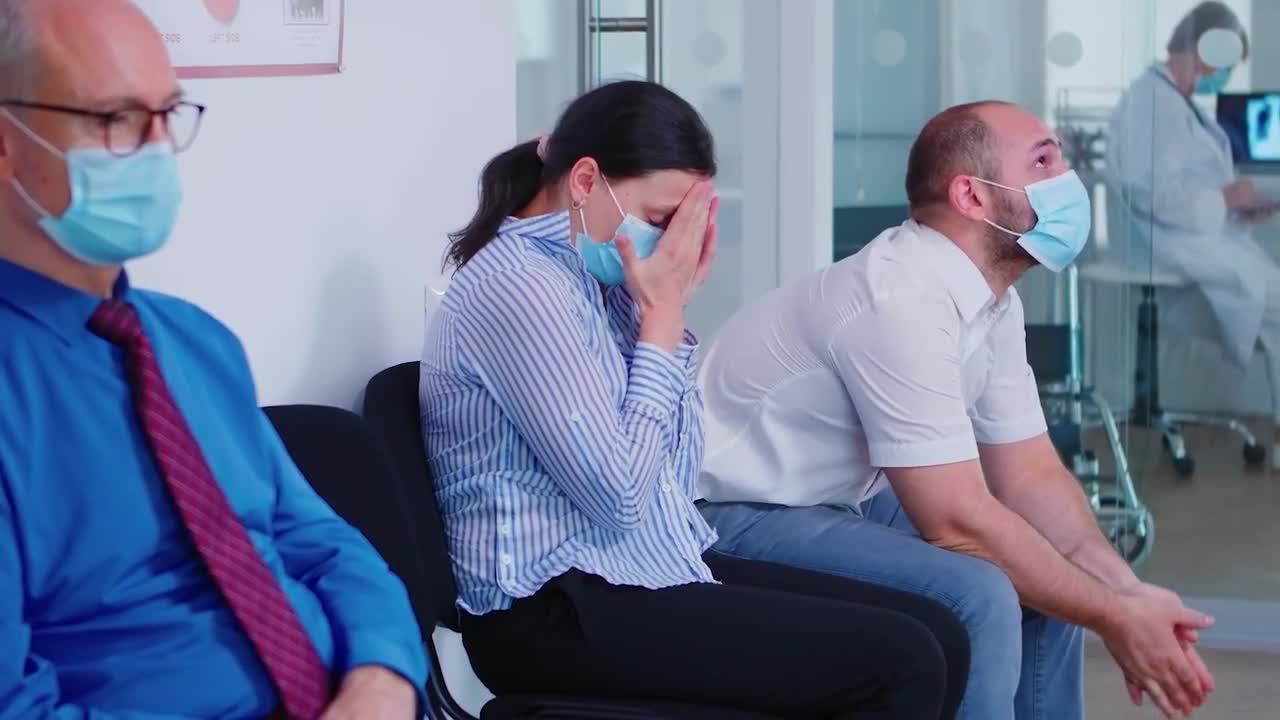 Couple Crying In Hospital Waiting Area - Stock Video | Motion Array