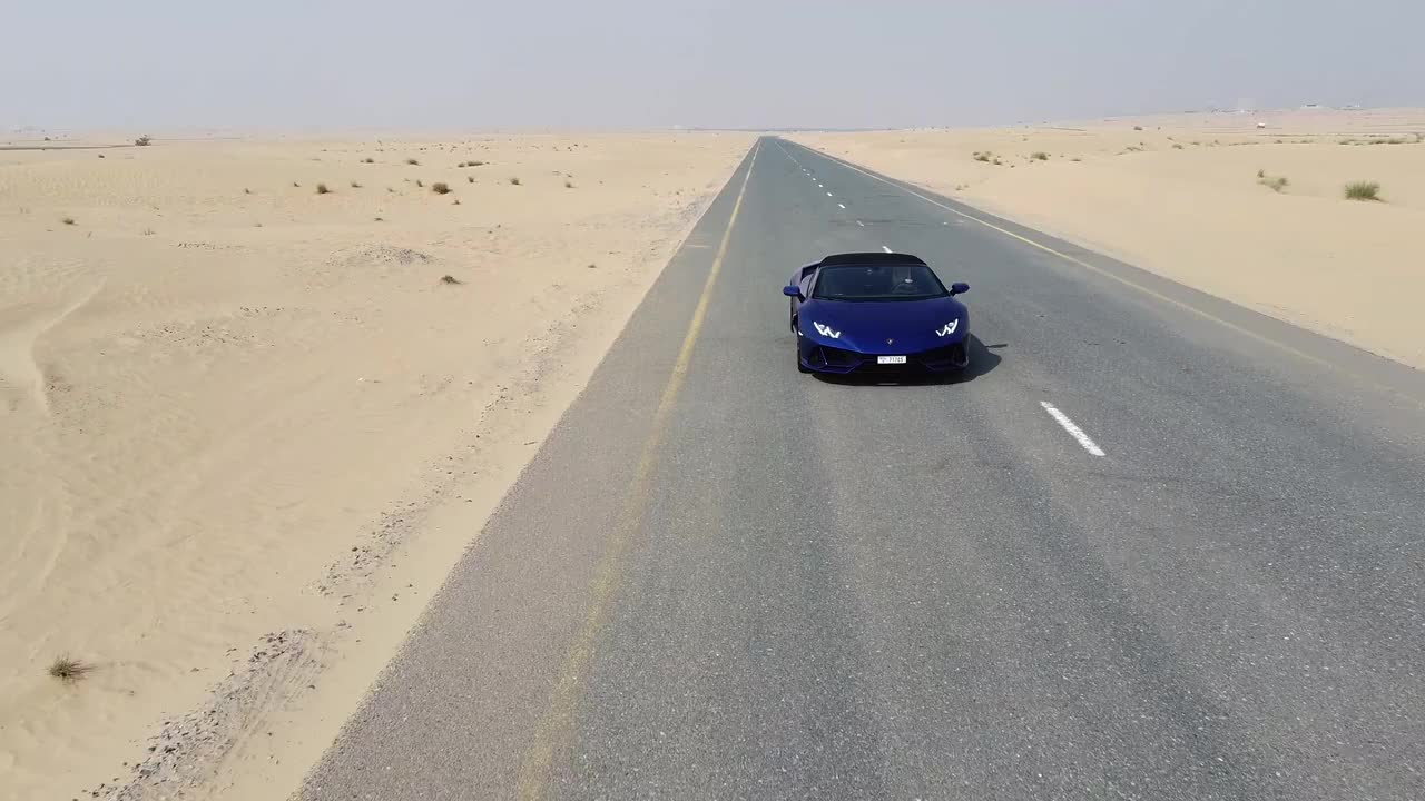 Luxury Car On An Empty Road - Stock Video | Motion Array