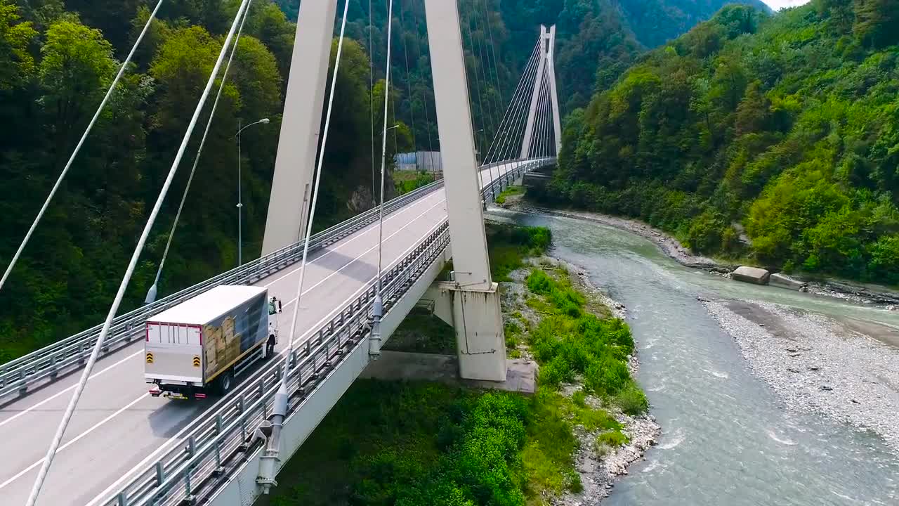 Truck Crossing Cable Bridge Aerial - Stock Video | Motion Array