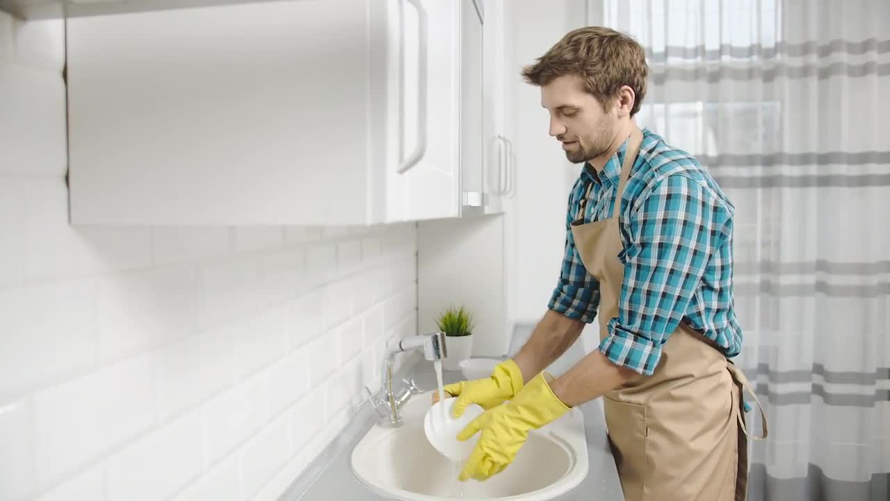 Man Washing Dishes - Stock Video | Motion Array