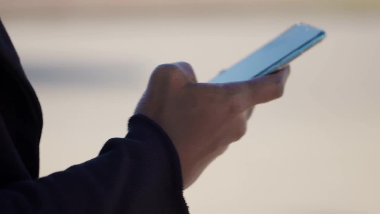 Walking With Phone - Stock Video | Motion Array