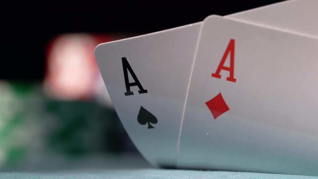 Two Aces In Hand - Stock Video | Motion Array