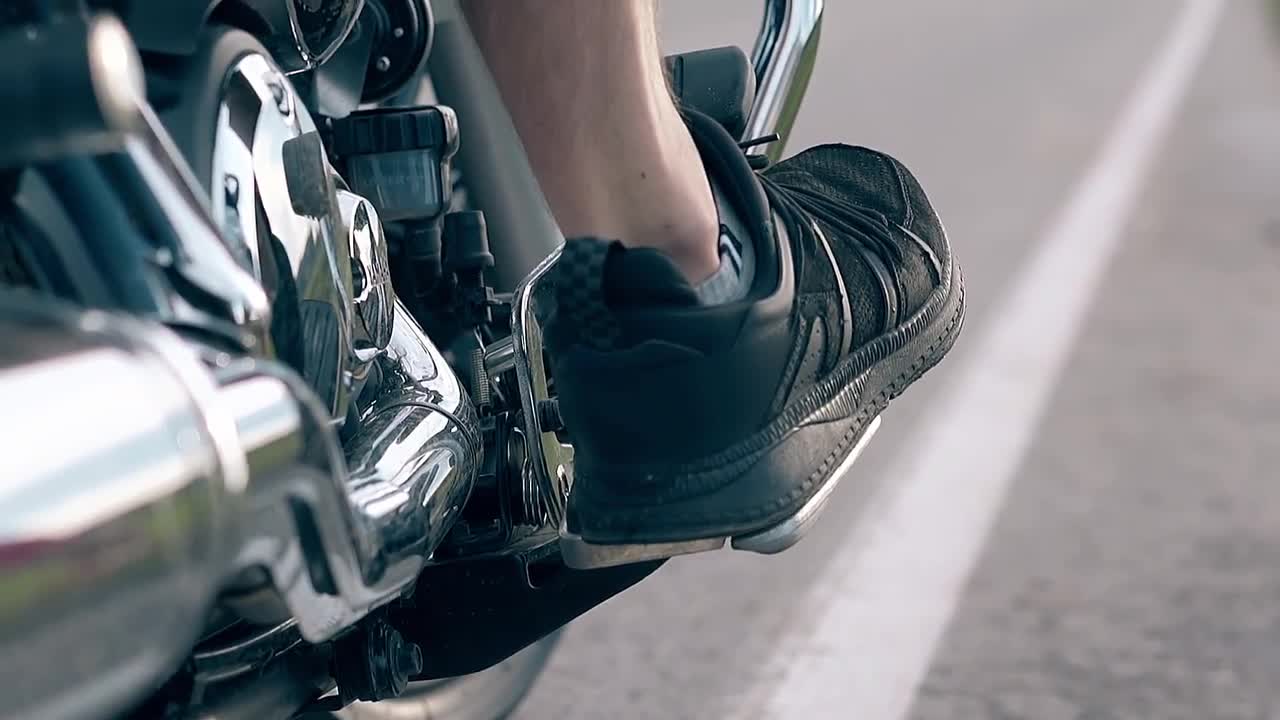 A Foot On The Motorbike - Stock Video | Motion Array