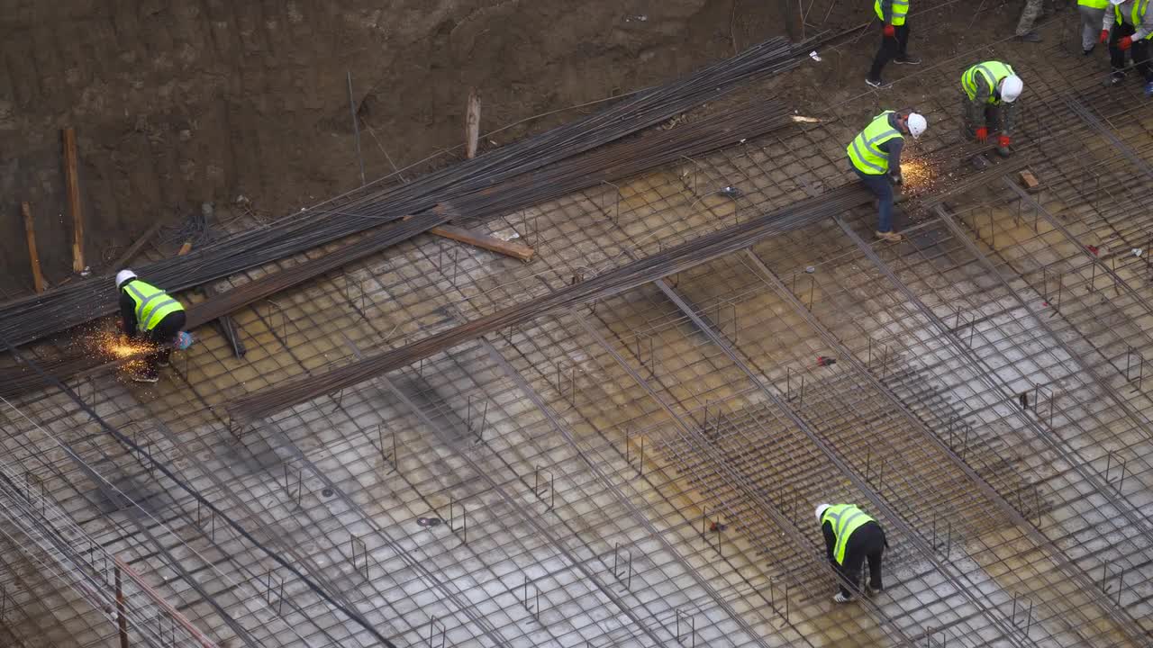 Construction Workers Cutting Rebar - Stock Video | Motion Array